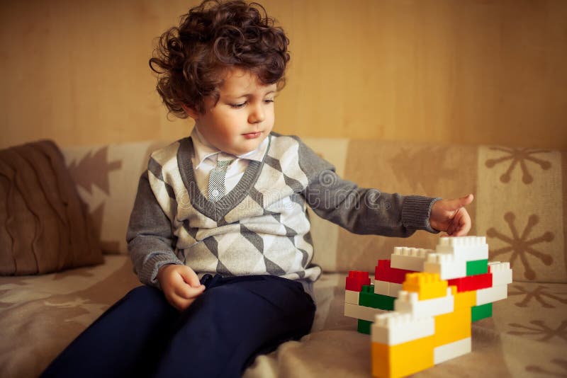 Little boy at home stock photo. Image of concentrating - 28294304