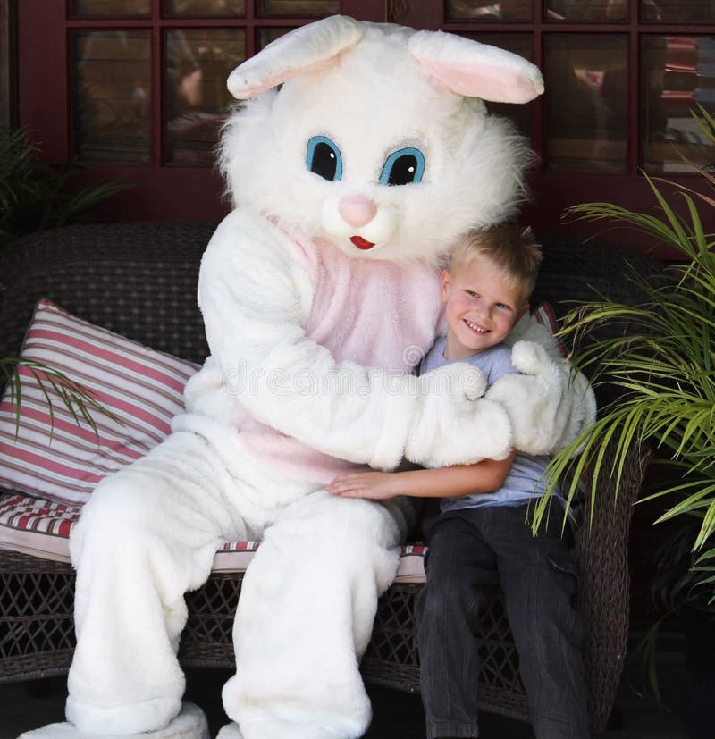 Little Boy Hugging the Easter Bunny Stock Photo - Image of green ...