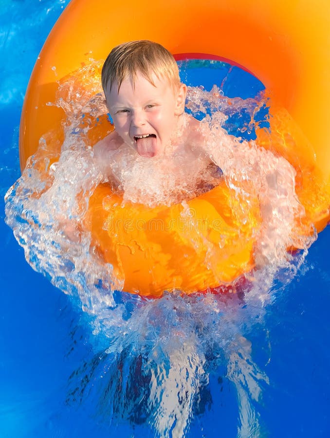 Little Boy on an Inflatable Circle in the Water Stock Image - Image of ...