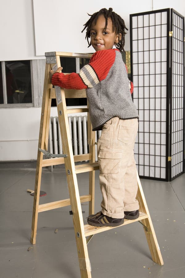 Little boy on a ladder stock photo. Image of climbing, attractive - 521532