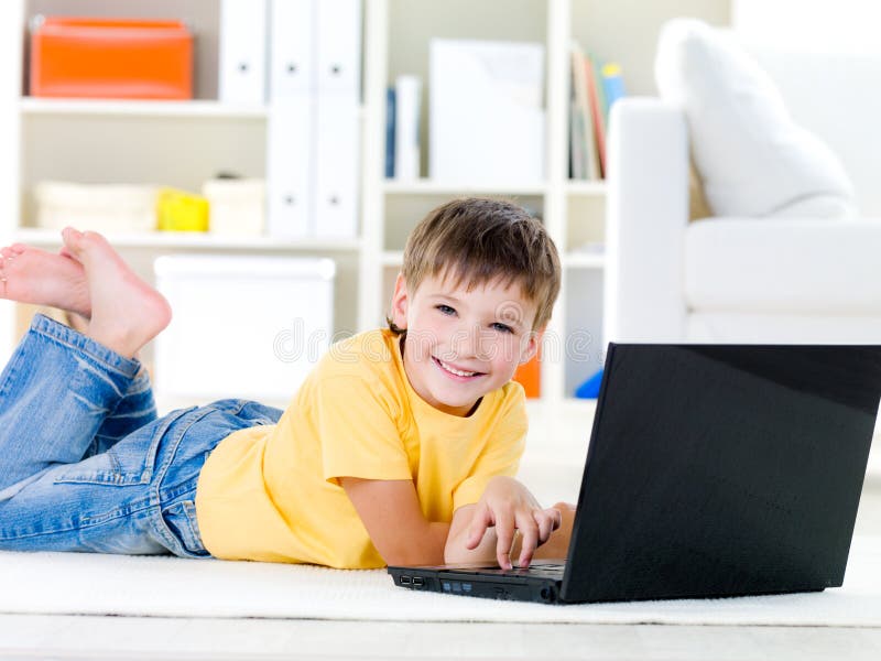 Teenage Boy and Laptop on Floor Stock Photo - Image of lifestyle, floor ...