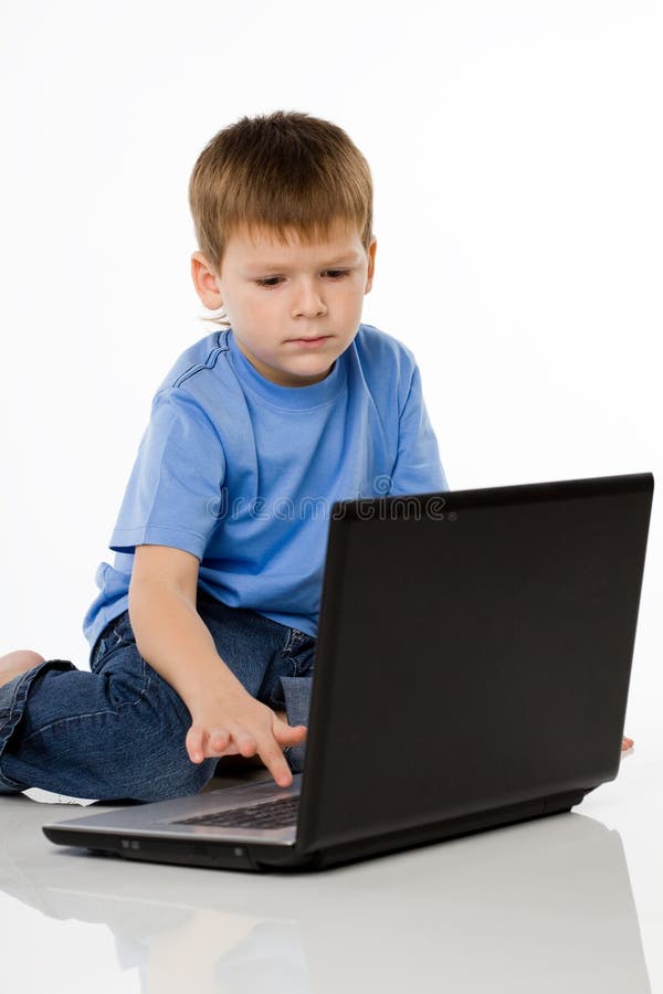 Little boy and laptop stock image. Image of internet - 17130683