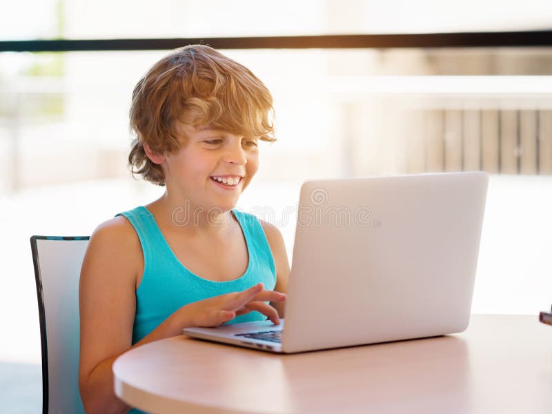 Little boy with laptop stock image. Image of digital - 61245915