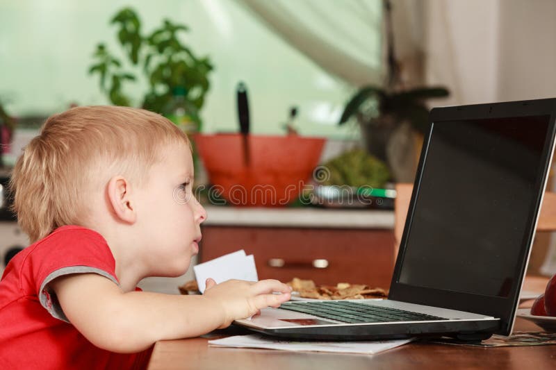 Little Boy with Laptop on Table in Home. Stock Photo - Image of focused ...
