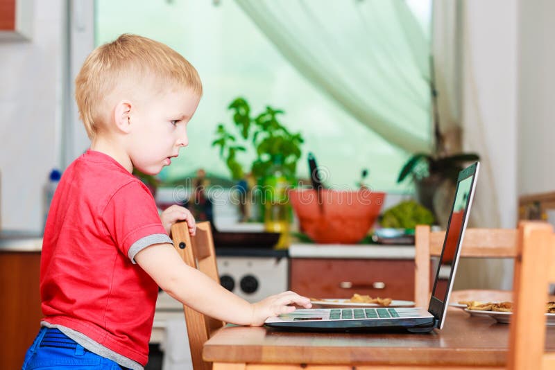 Little Boy with Laptop on Table in Home. Stock Image - Image of ...