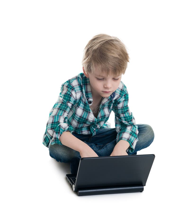 School Boy using a laptop stock image. Image of education - 28039207