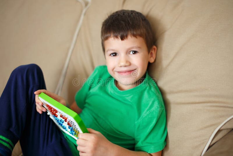 Little Boy Learn Counting on Abacus Stock Photo - Image of indoor ...