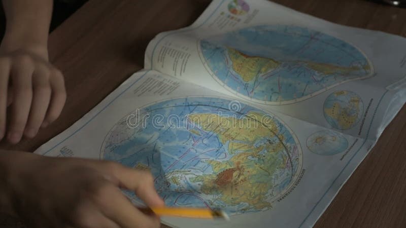 Little Boy Learning Geography - Looking at Maps and the Globe Stock ...