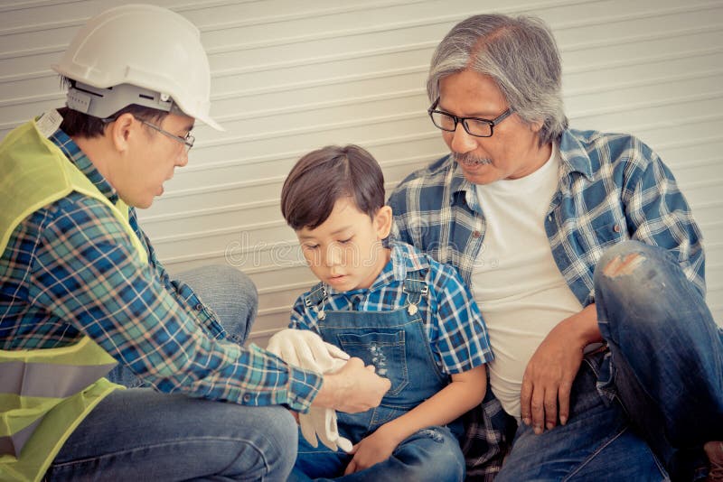 Little Boy Learning from His Construction Multi Generation Family Stock ...
