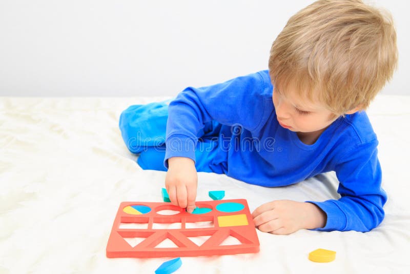 Little boy learning shapes stock photo. Image of occupied - 39096102