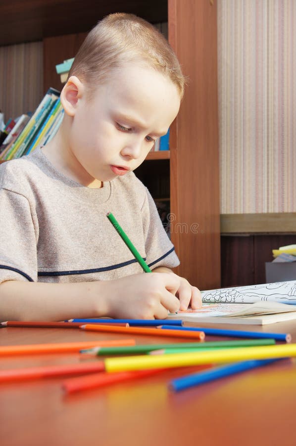Little Boy is Learning To Draw with Pencils Stock Photo - Image of ...