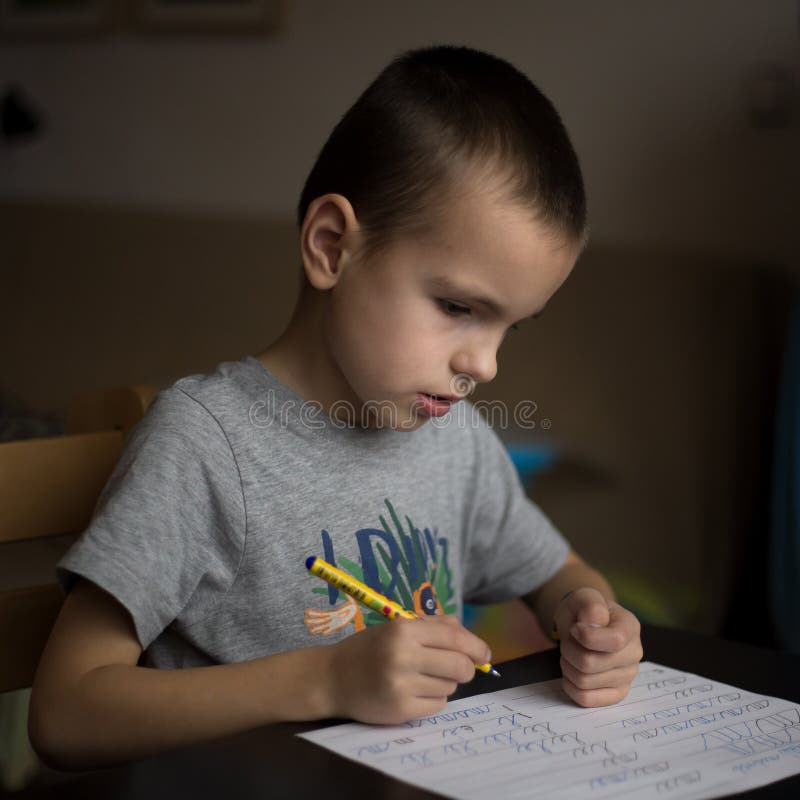 Little Boy Learns To Write Homework Stock Photo - Image of learn ...