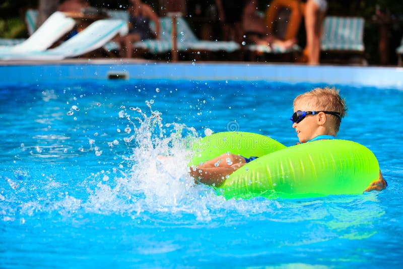Little Boy in Life Ring Having Fun at Swimming Pool Stock Photo - Image ...