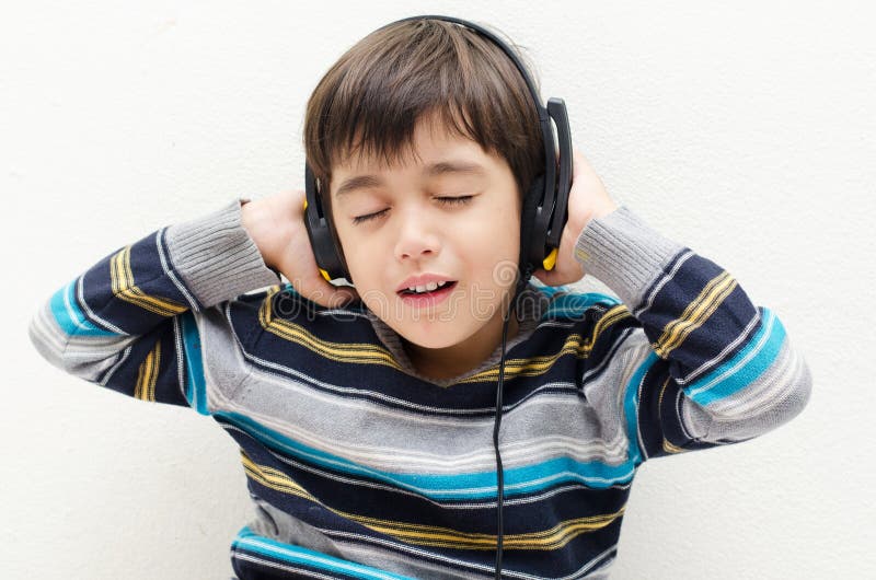 Little Boy Listening the Music with Headset Stock Photo - Image of ...