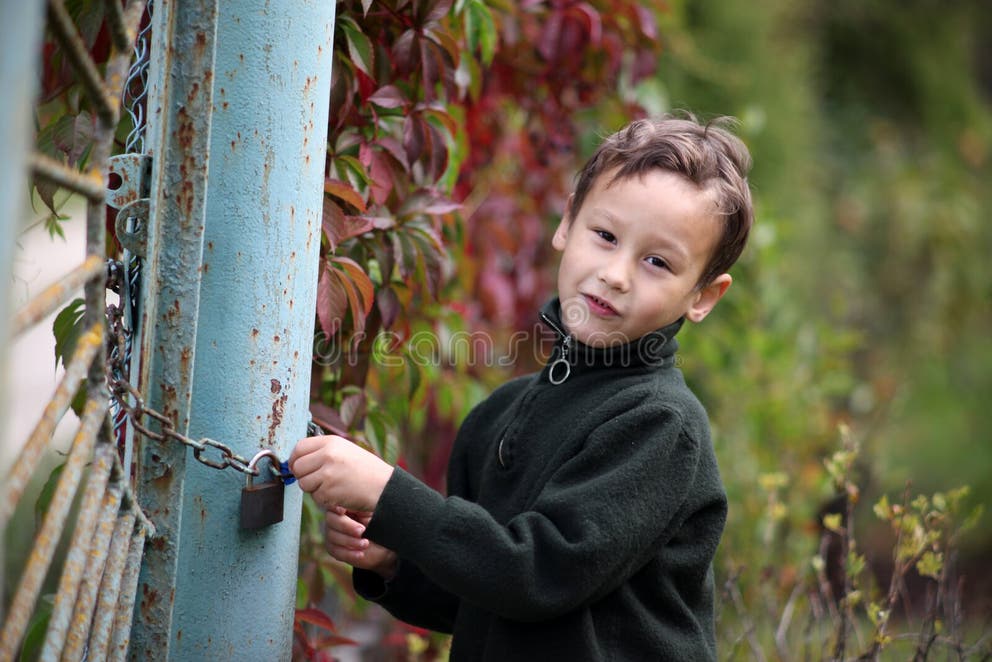 Little boy at lock door stock image. Image of child, caucasian - 59767415