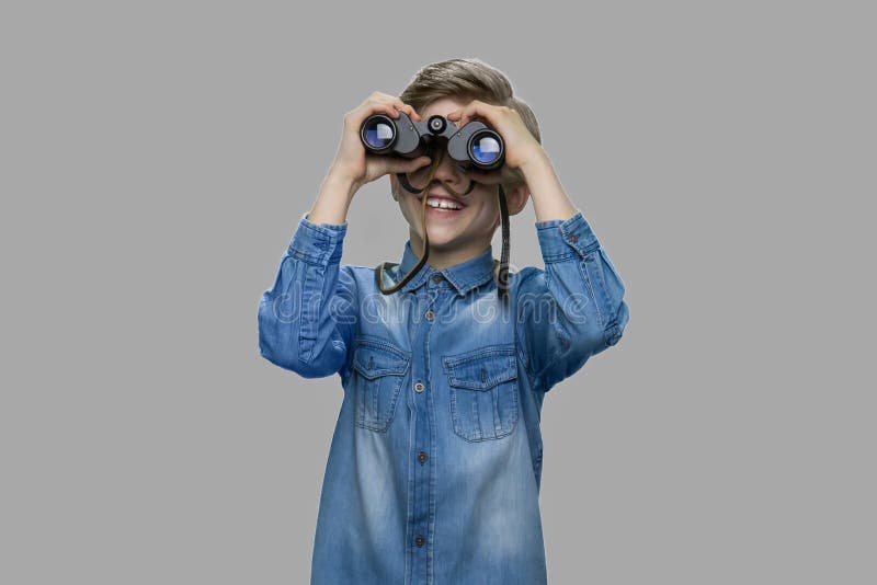 Little Boy Looking through Binoculars. Stock Photo - Image of ...