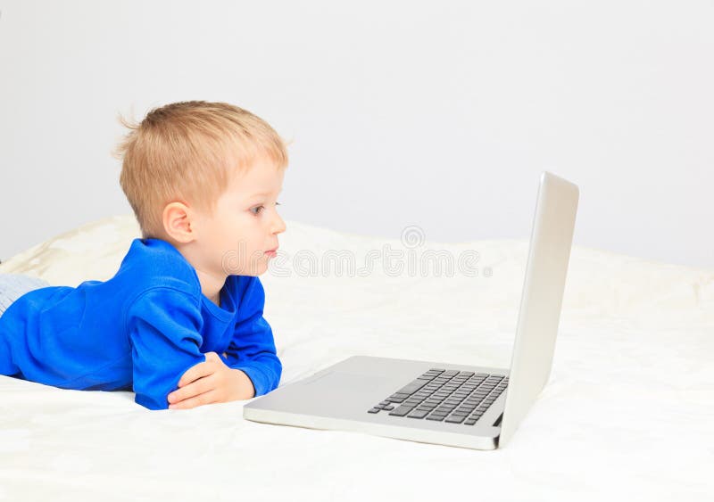 Little Boy Looking at Computer Stock Photo - Image of contemporary ...