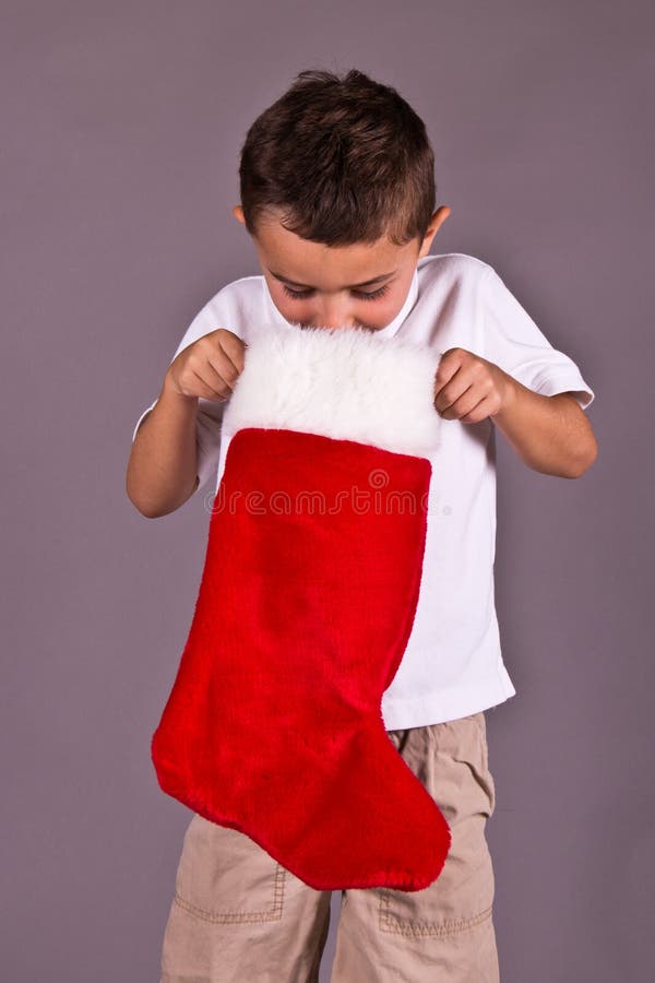 Little Boy Looking His Christmas Stocking Stock Photos - Free & Royalty ...