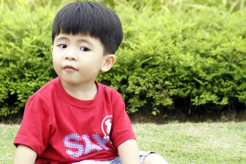 Little boy looking left stock image. Image of curious - 2615373