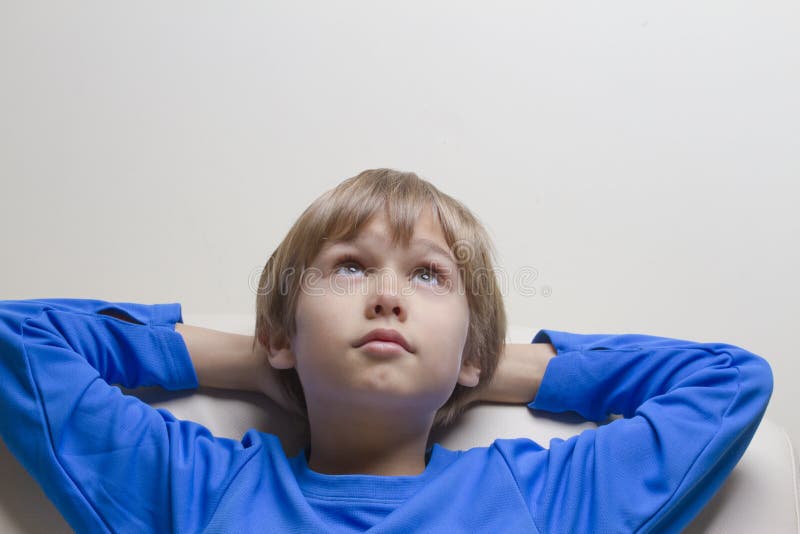 Little Boy Looking Up while Dreaming or Thinking. Copy Space for Text ...