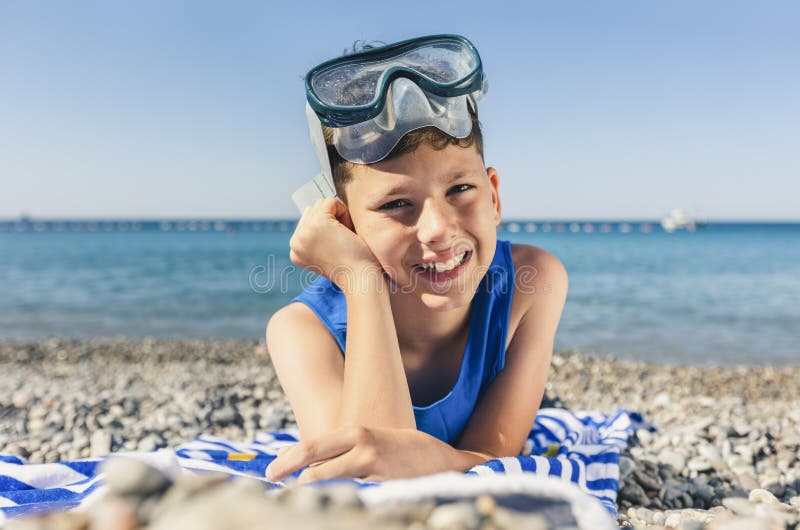 Boy Lying on Beach and Having Fun Stock Image - Image of childhood ...