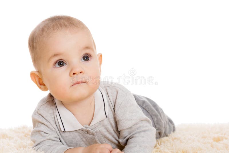 Little boy lying on a rug stock photo. Image of caucasian - 46532476