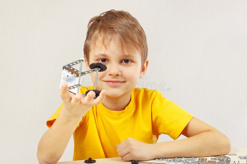 Little Boy Made Something of Mechanical Constructor Stock Image - Image ...