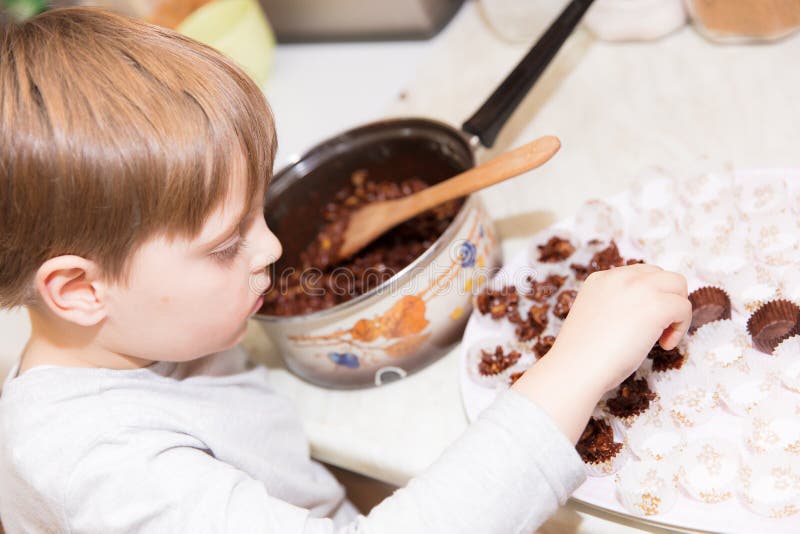Little boy making cookies stock photo. Image of toddler - 245437474