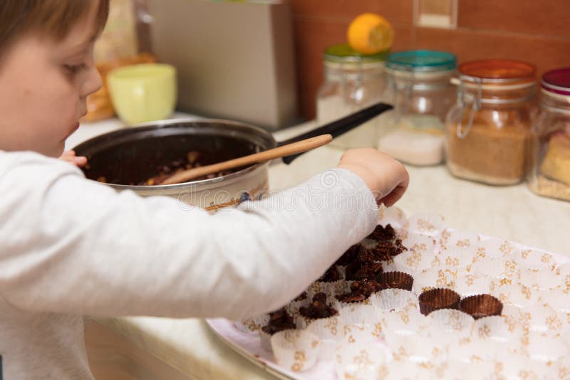 Little boy making cookies stock image. Image of child - 245437499