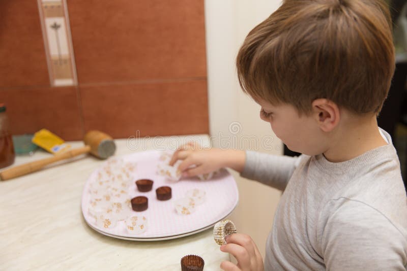 Little boy making cookies stock photo. Image of bake - 245437302