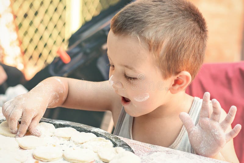 Little Boy Making Dumplings at Table Stock Image - Image of caucasian ...