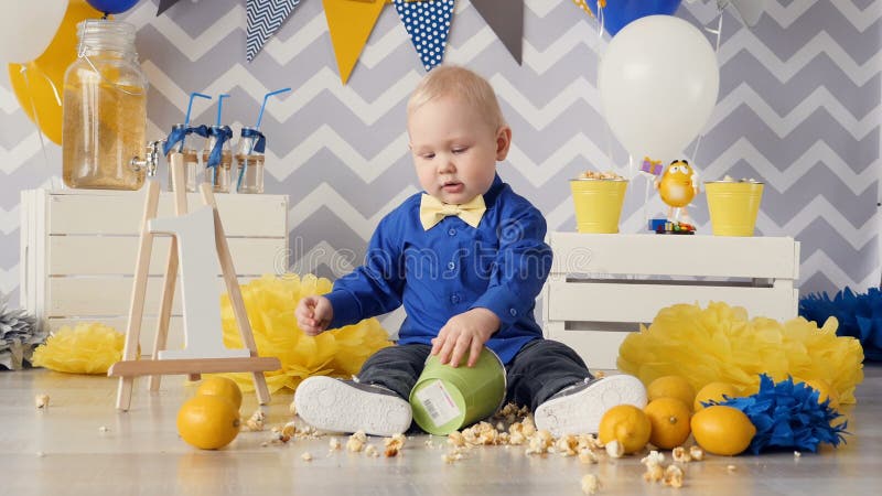 Little Boy Making a Mess, Scattering Popcorn. Stock Footage - Video of ...