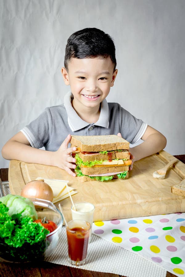 Little Boy Making a Sandwich Stock Photo - Image of hunger, enjoying ...