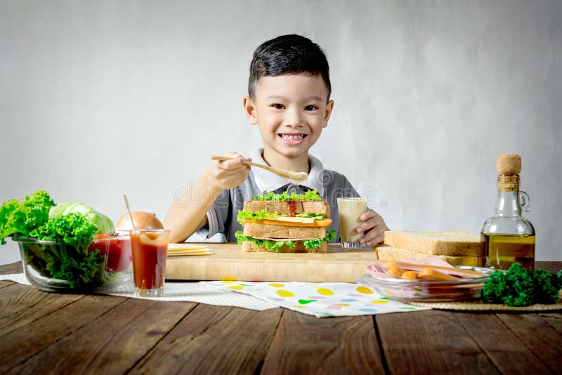 Little Boy Making a Sandwich Stock Image - Image of indoors, lifestyle ...