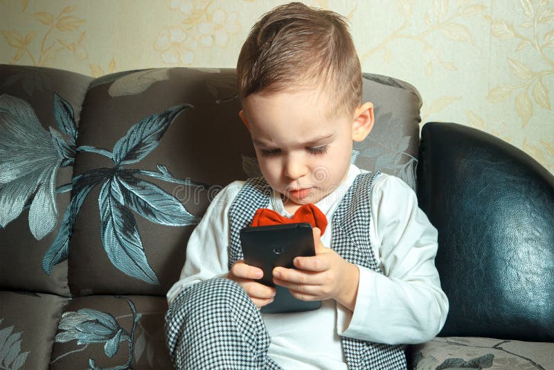 Little Boy with Mobile Phone Stock Image - Image of message, game: 75923449