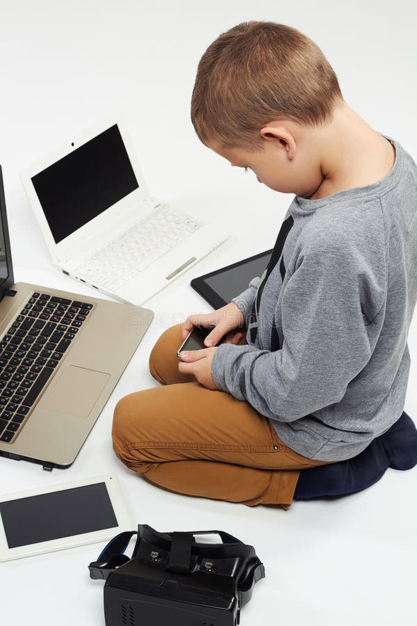 Little Boy and New Technology Stock Image - Image of electronic ...