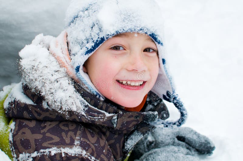 Little boy out in the snow stock image. Image of recreation - 18379411