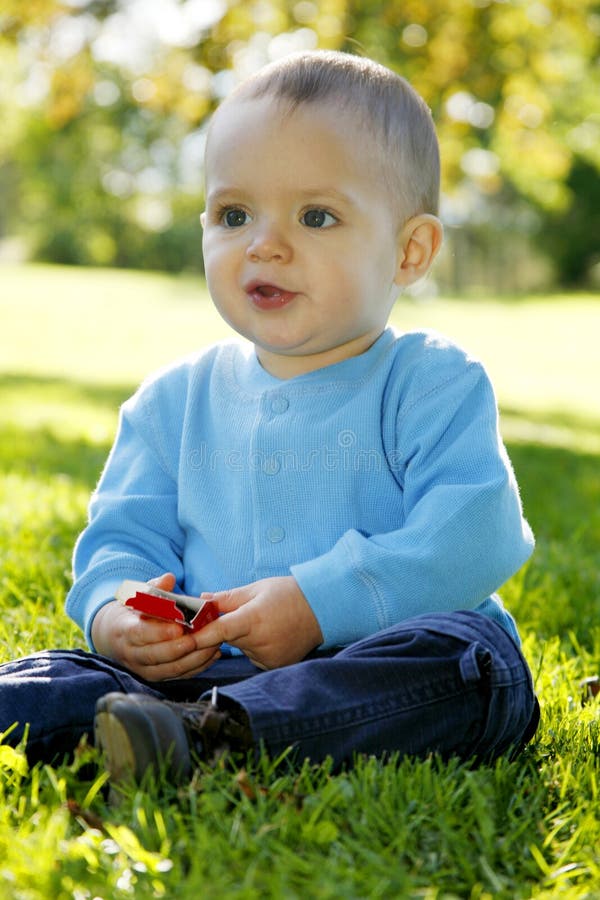 Little boy outdoors stock photo. Image of happy, lovable - 1311454