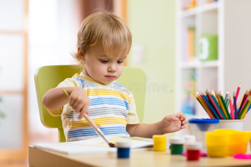 Little Boy Painting on Creative Class in Stock Image - Image of ...