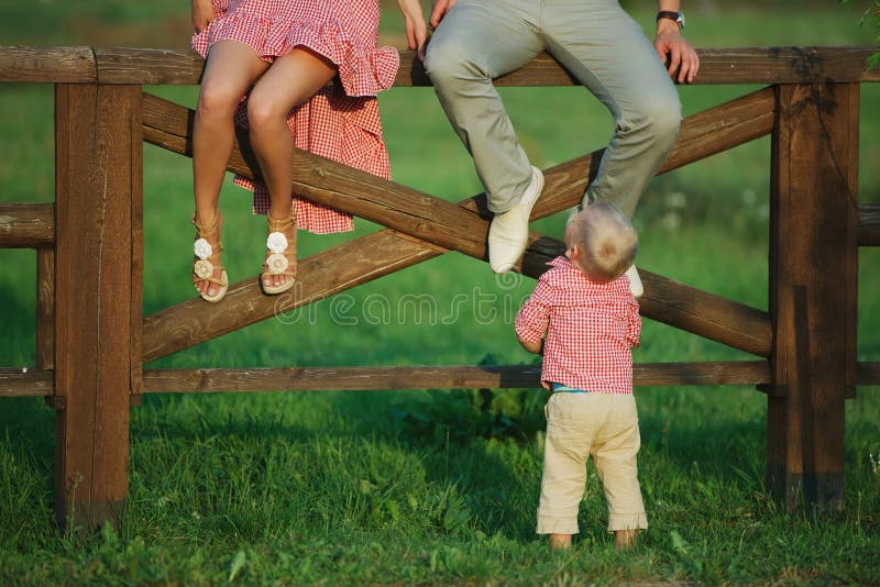 Little Boy with Parents Outdoors Stock Image - Image of family, parent ...