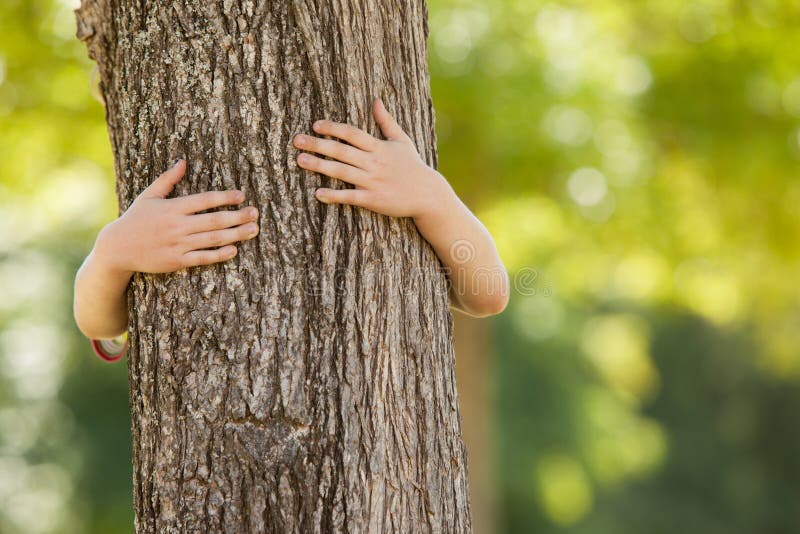 Children hugging tree stock image. Image of concept, happy - 73890133