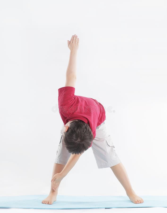 Little Boy Performs an Exercise To Stretch the Muscles.isolated on ...