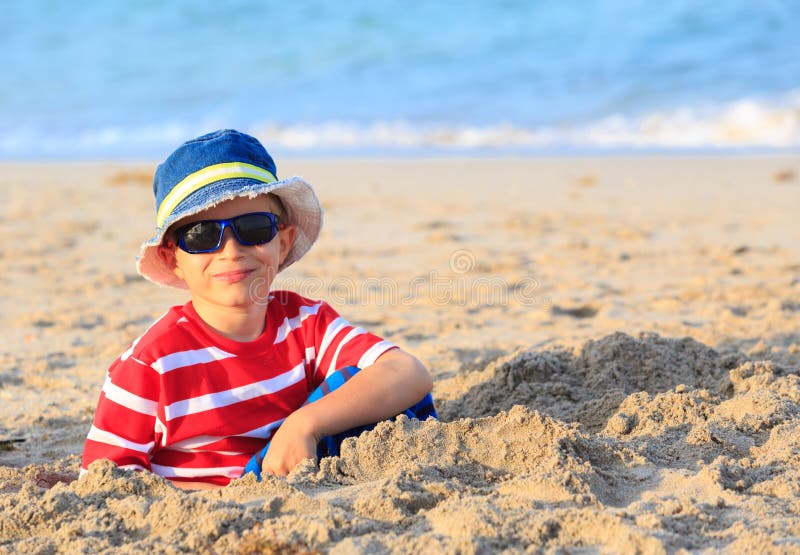 Little Boy Play with Sand on Beach Stock Image - Image of face, care ...
