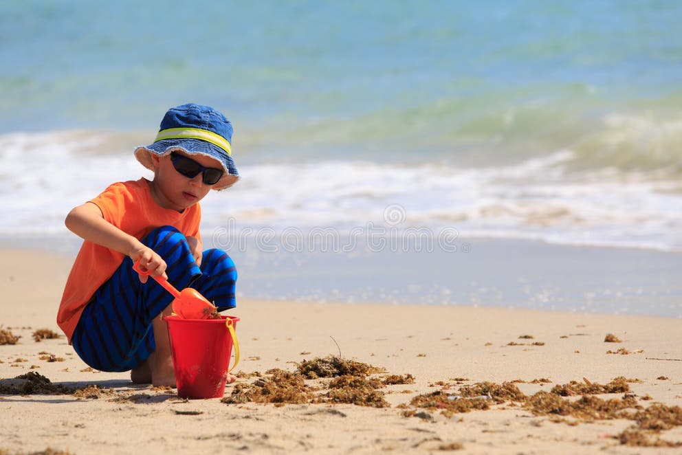 Little Boy Play with Sand on Beach Stock Image - Image of beach, enjoy ...