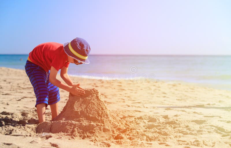 Little Boy Play with Sand on Beach Stock Photo - Image of enjoy, happy ...
