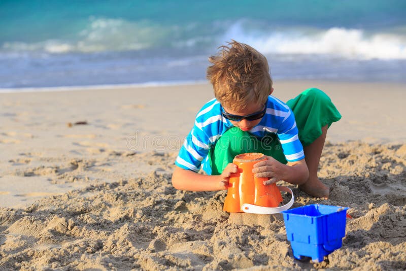 Little Boy Play with Sand on Beach Stock Photo - Image of youth, care ...