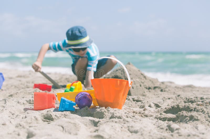 Little Boy Play with Sand on Beach Stock Photo - Image of care, young ...