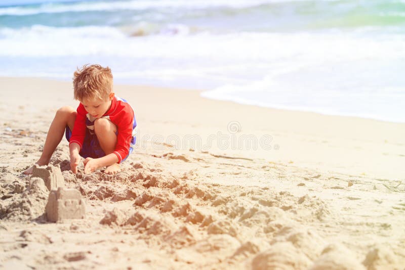 Little Boy Play with Sand on Summer Beach Stock Photo - Image of summer ...