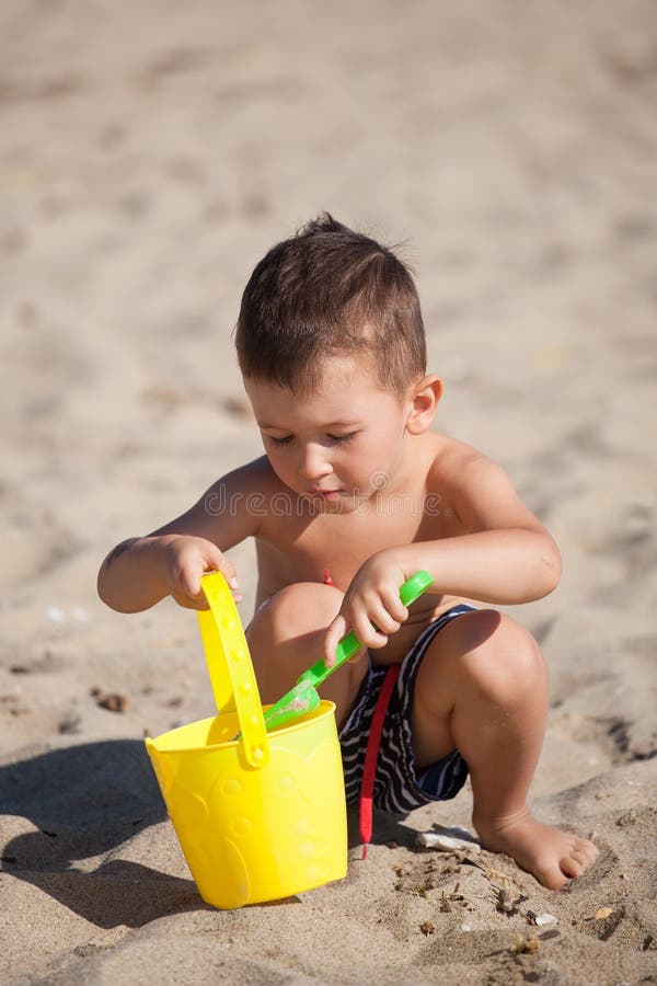 Little Boy Play with Sand on Summer Beach Stock Photo - Image of ...