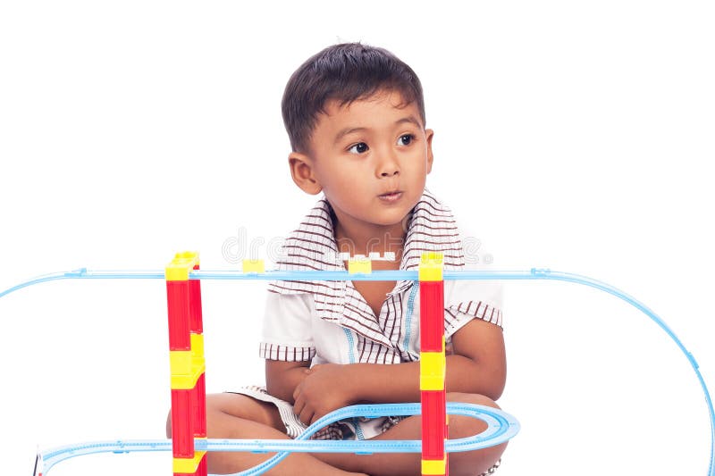 Little boy play train toy stock image. Image of white - 65173325